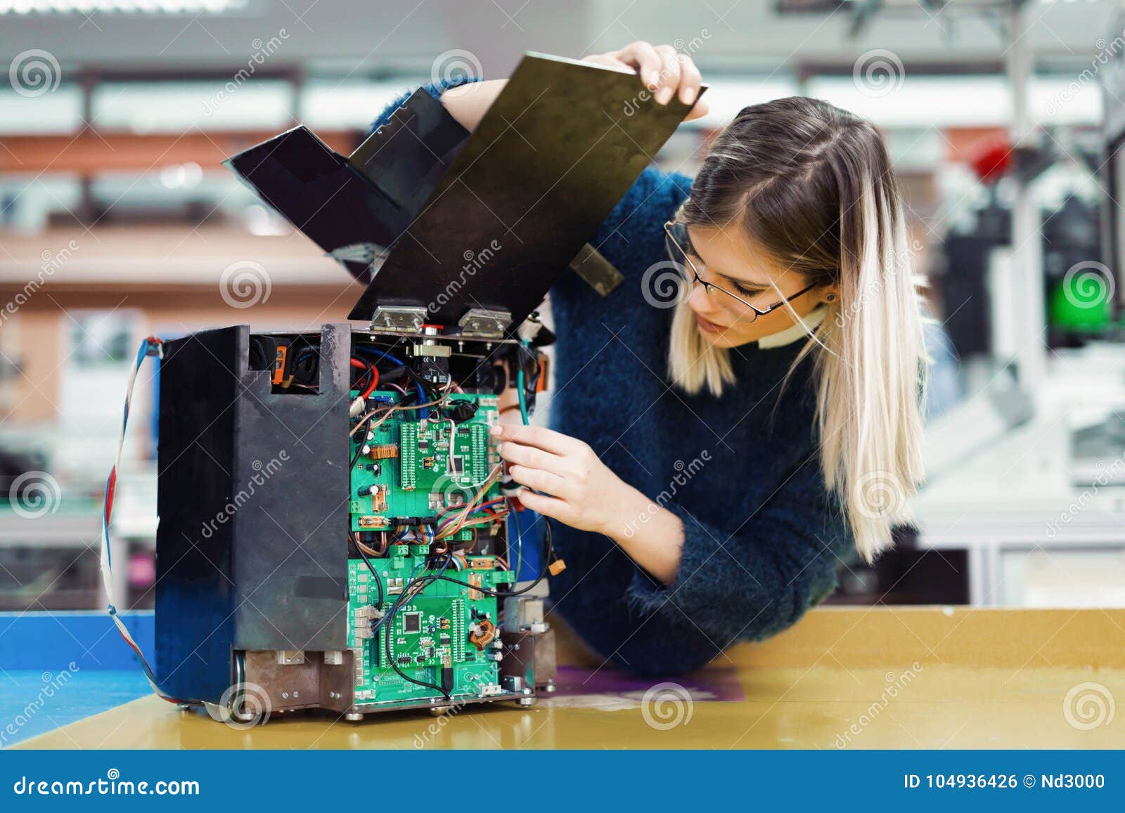 Young Woman Engineer Working on Robotics Project Stock Photo - Image of ...