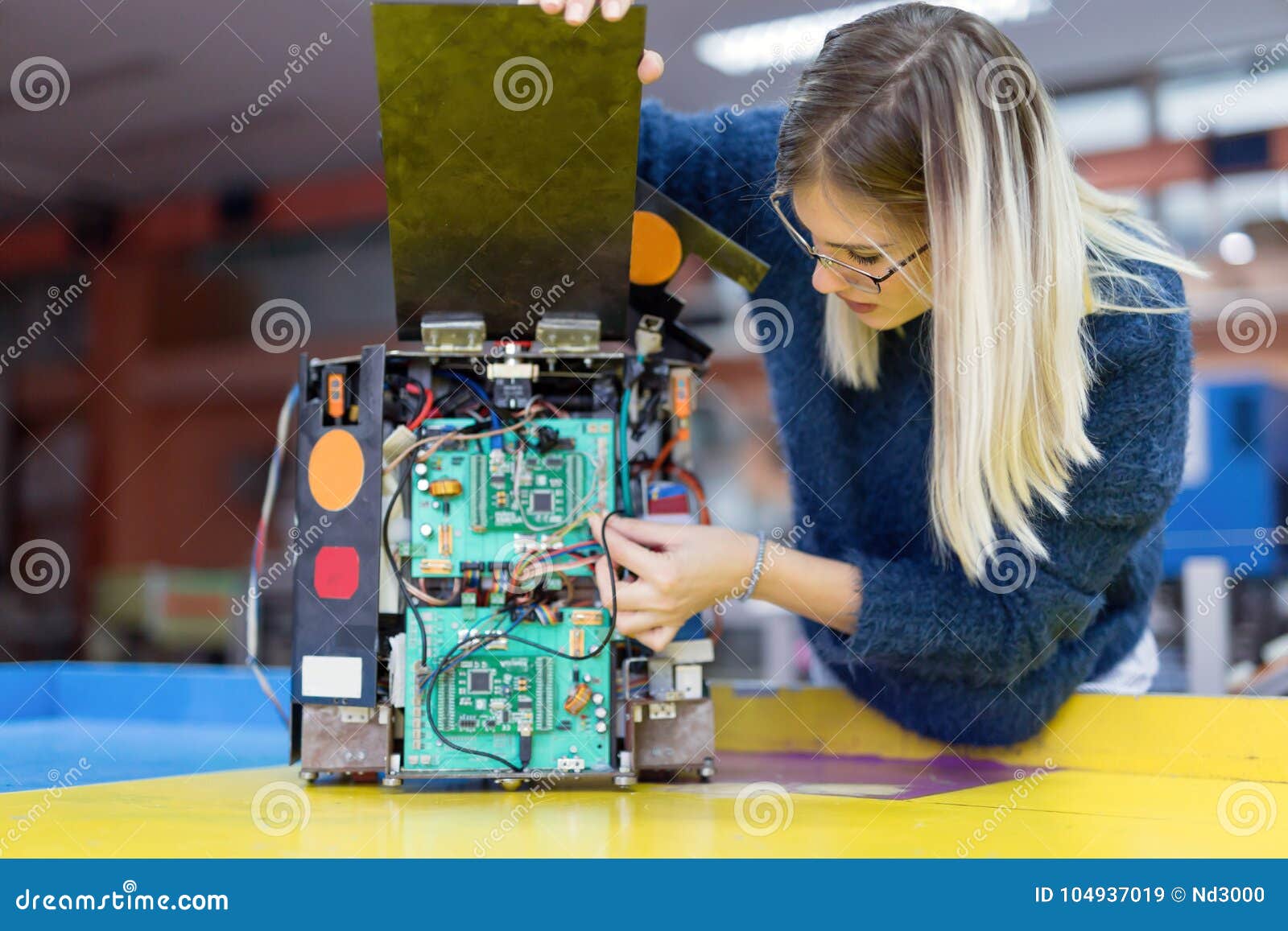Young Woman Engineer Working on Robotics Project Stock Image - Image of ...