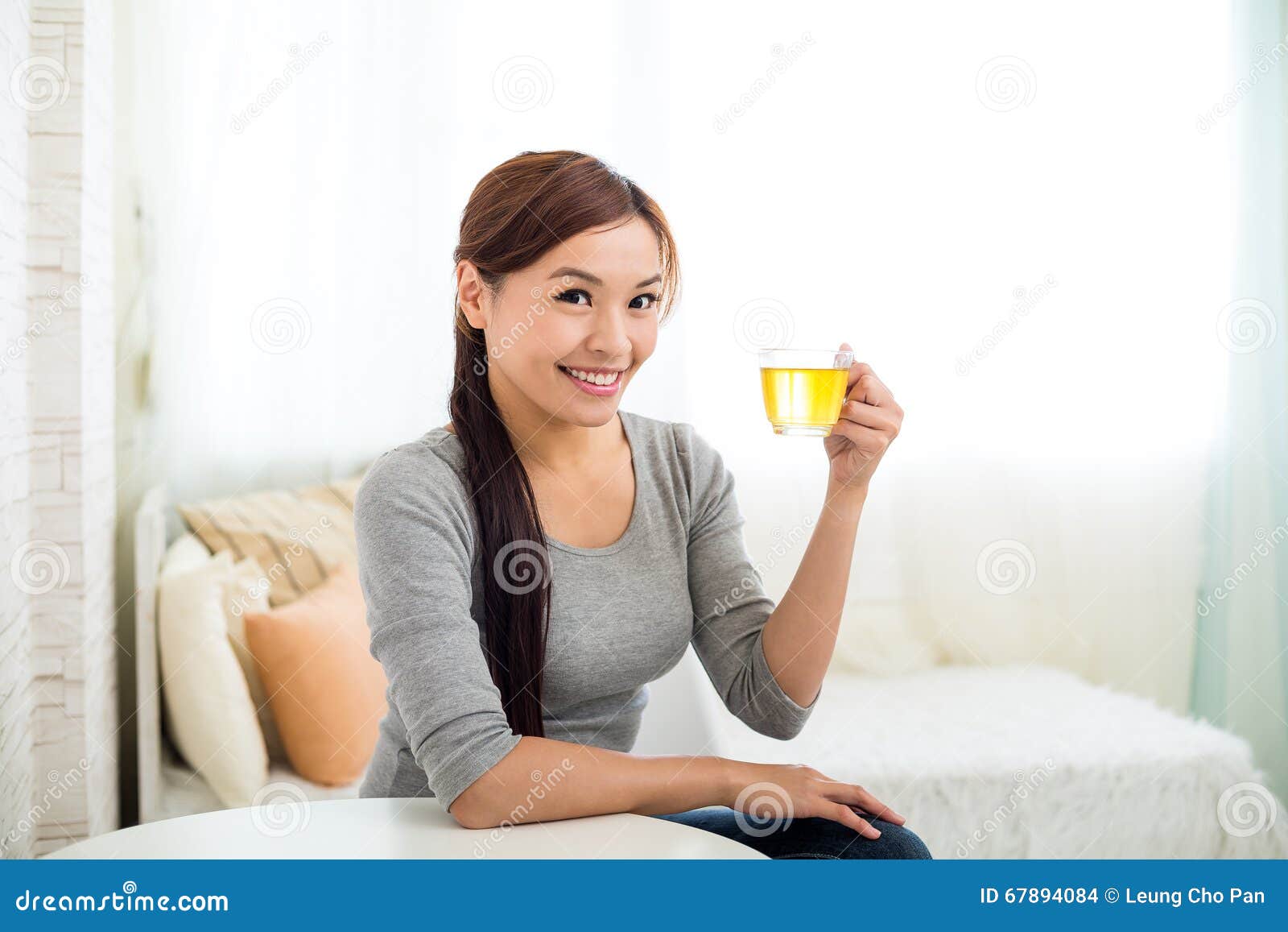Young Woman enjoy her tea stock photo. Image of china - 67894084