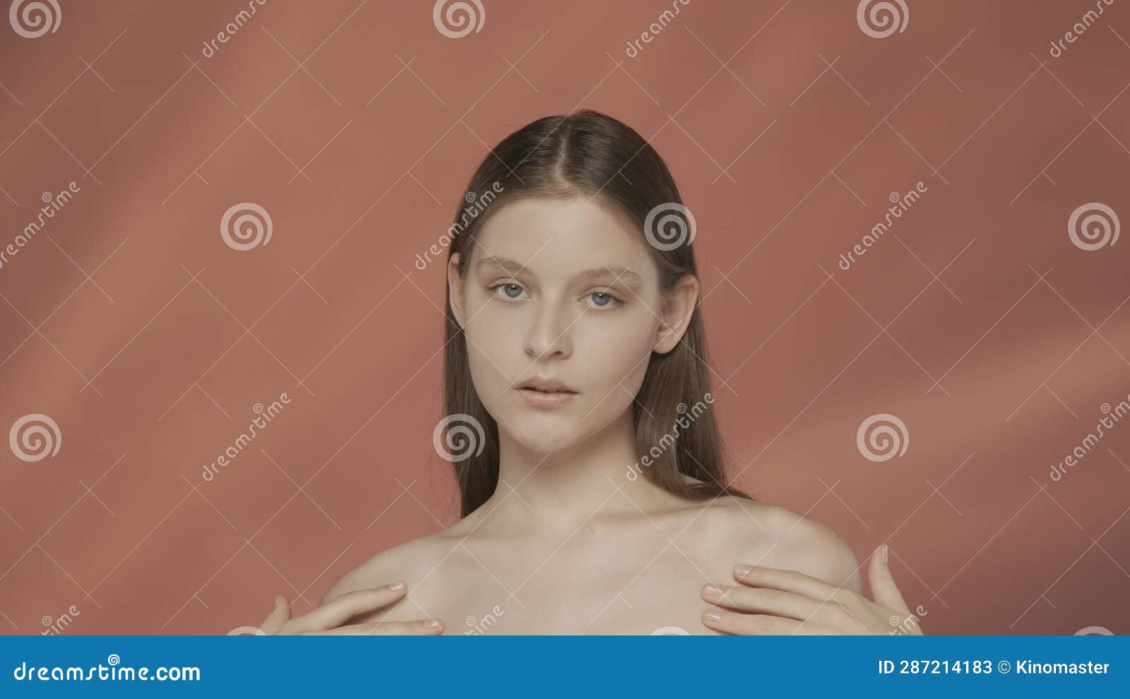 The Young Woman Enjoys Her Smooth Clean Silky Skin Runs Her Hand Over