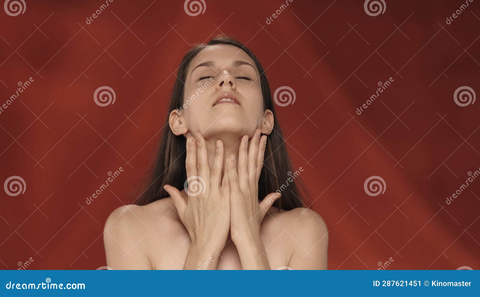The Young Woman Enjoys Her Smooth Clean Silky Skin Touches The Neck