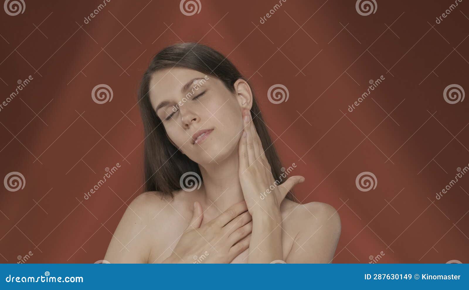 The Young Woman Enjoys Her Smooth Clean Silky Skin Touches The Neck