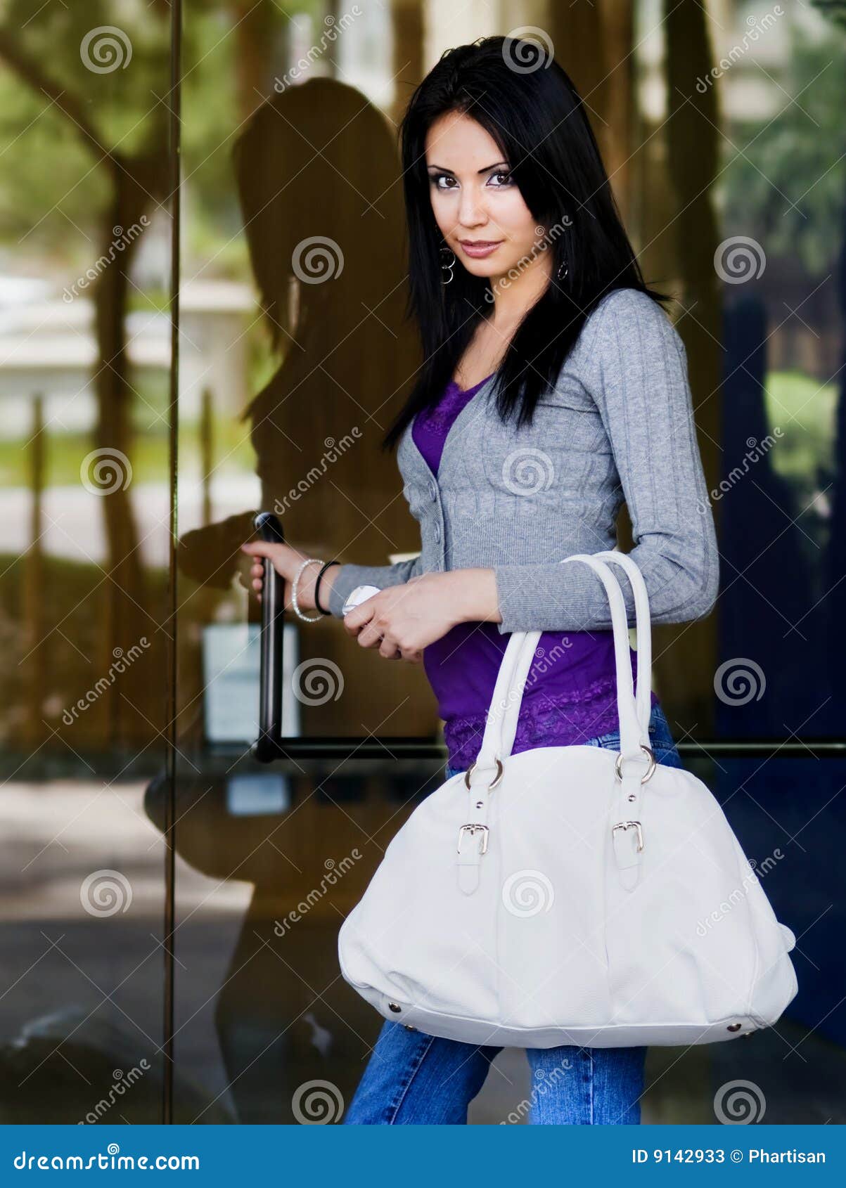 Young Woman Entering Building Doorway Stock Image - Image of door ...