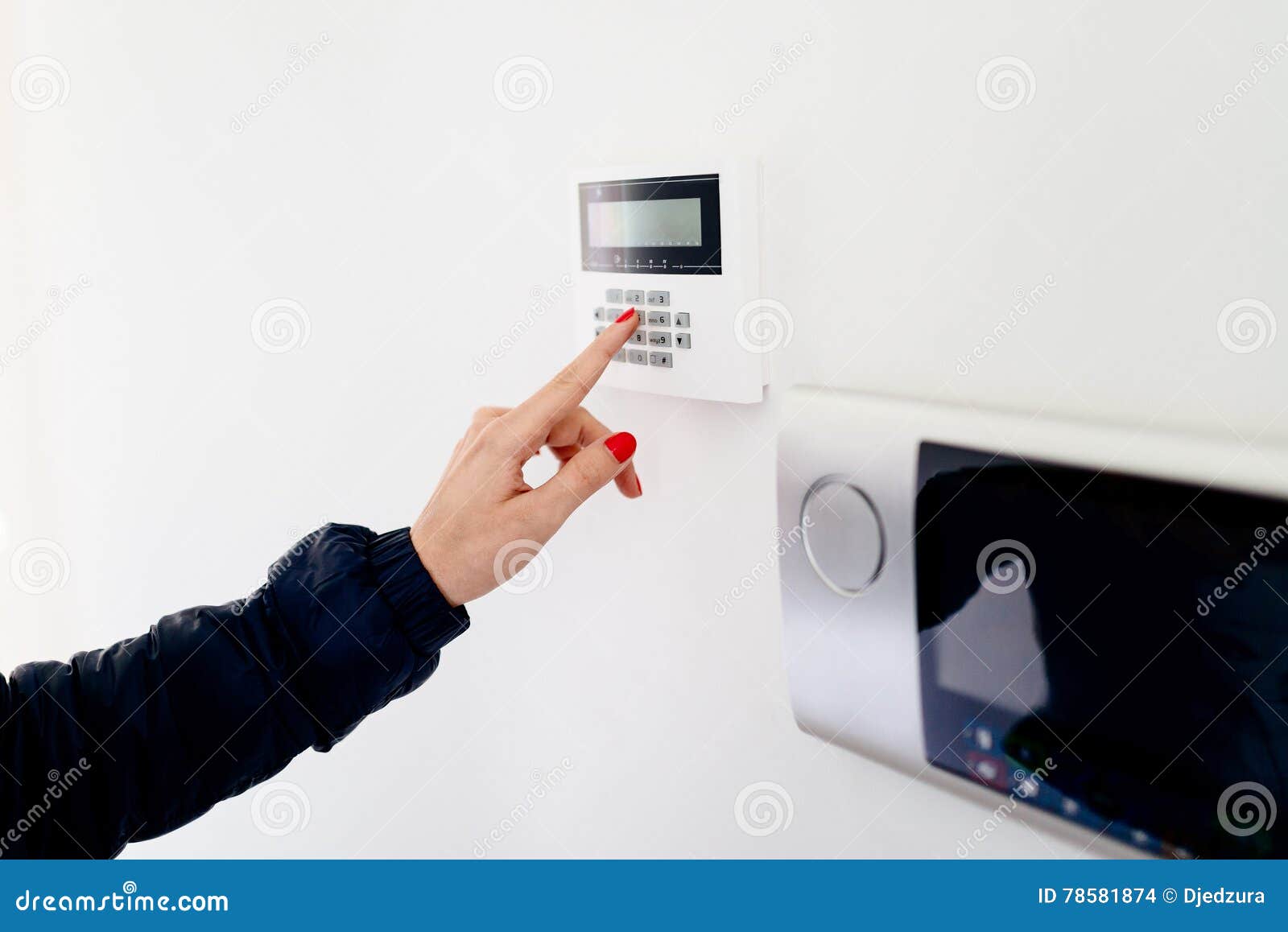 Young Woman Entering Security Code on Keypad Stock Photo - Image of ...