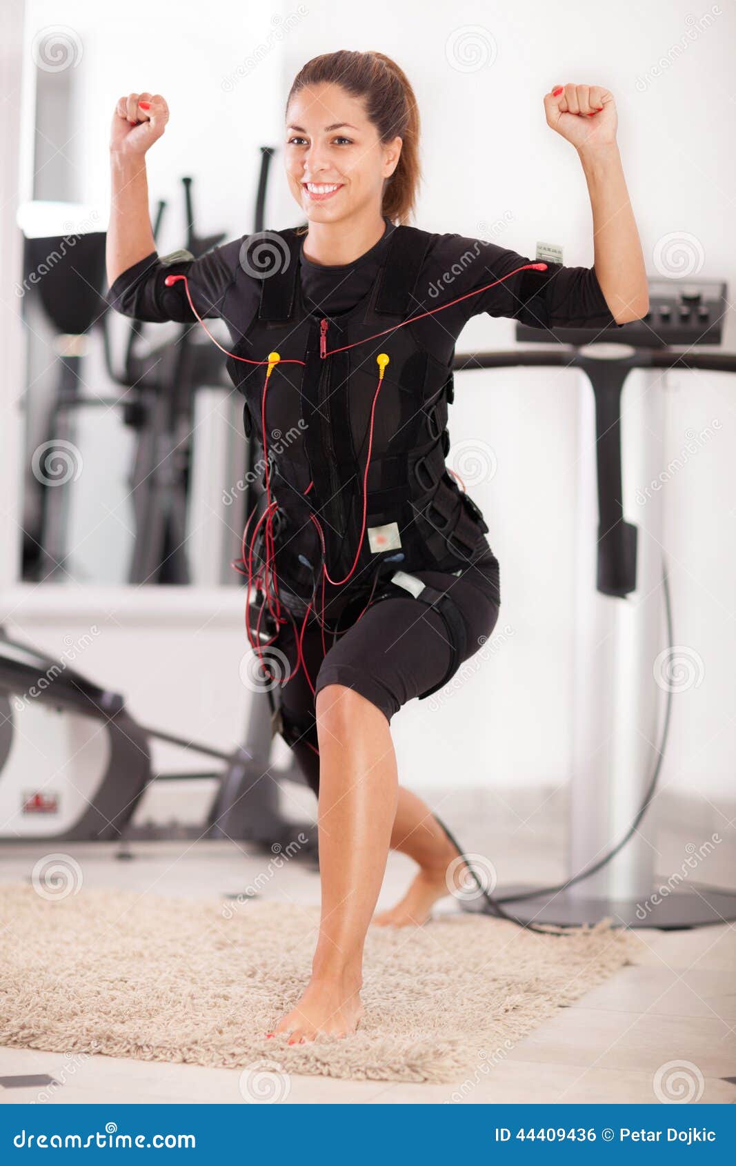 Young Woman Exercise on Electro Stimulation Machine Stock Photo - Image ...