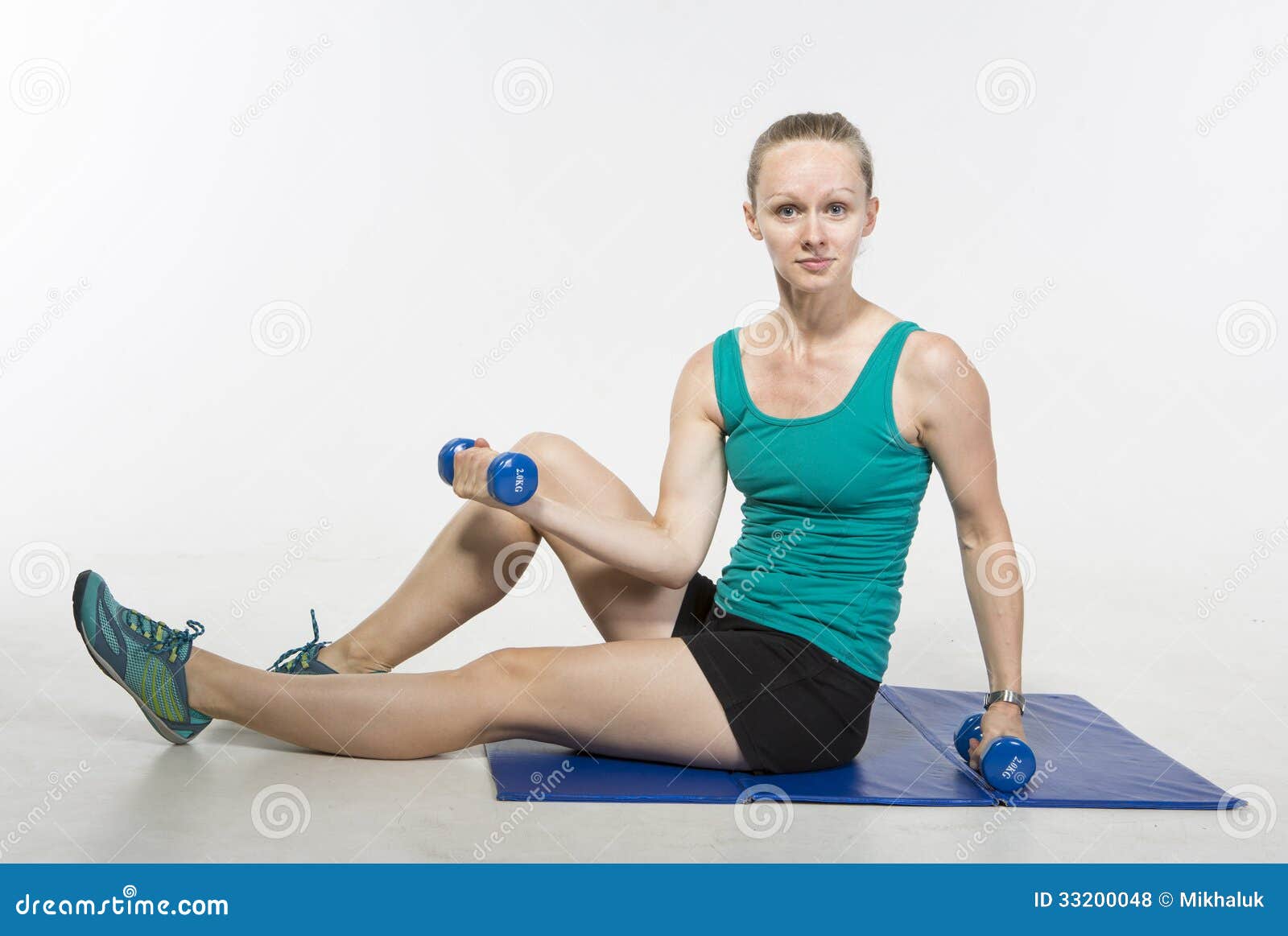 Young woman exercises stock photo. Image of energy, lift - 33200048