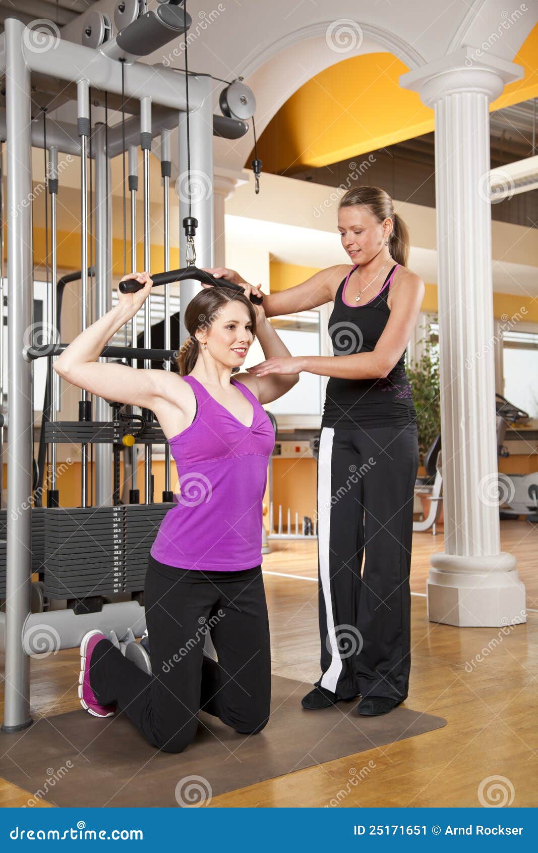 Young Woman Exercising in Gym with Trainer Stock Image - Image of build ...