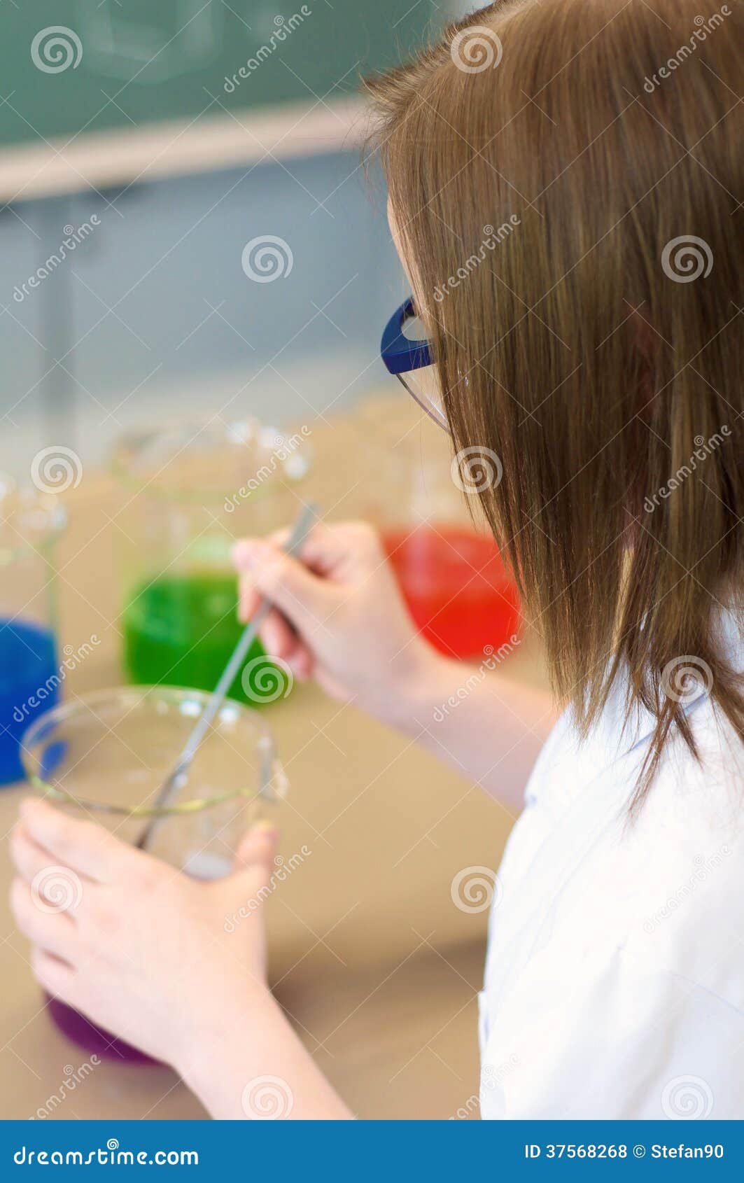 Young Woman Experimenting in a Laboratory Stock Photo - Image of ...