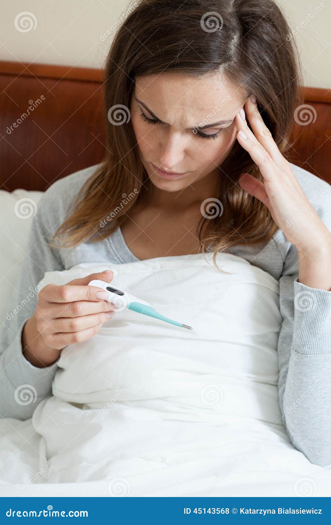 Young woman with a fever stock photo. Image of suffer - 45143568