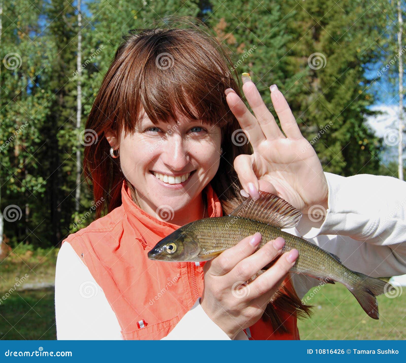 Young woman with a fish stock photo. Image of sport, extreme - 10816426