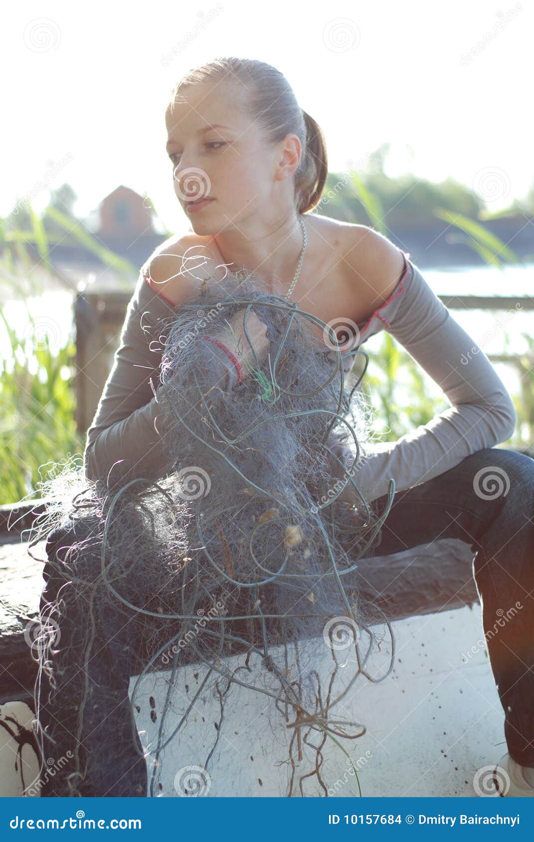 Young Woman and Fishing Net Stock Photo - Image of cheerful, female ...