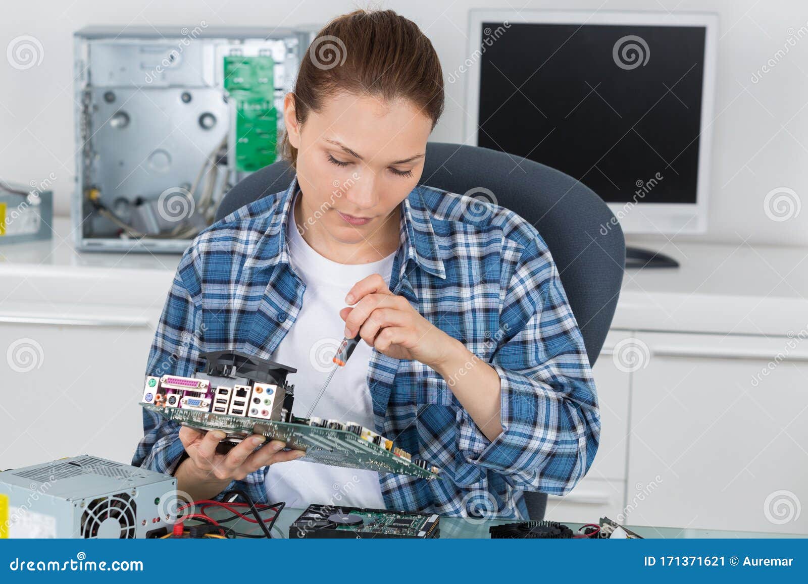 Young Woman Fixing Computer Motherboard Stock Image - Image of device ...