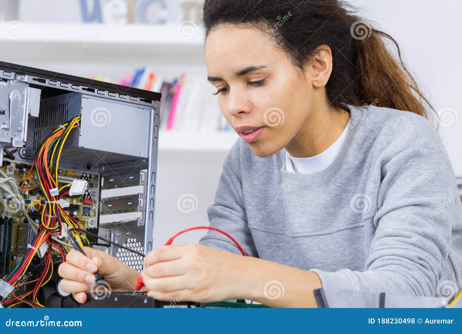 Young Woman Fixing Computer Stock Photo - Image of screwdriver, desk ...