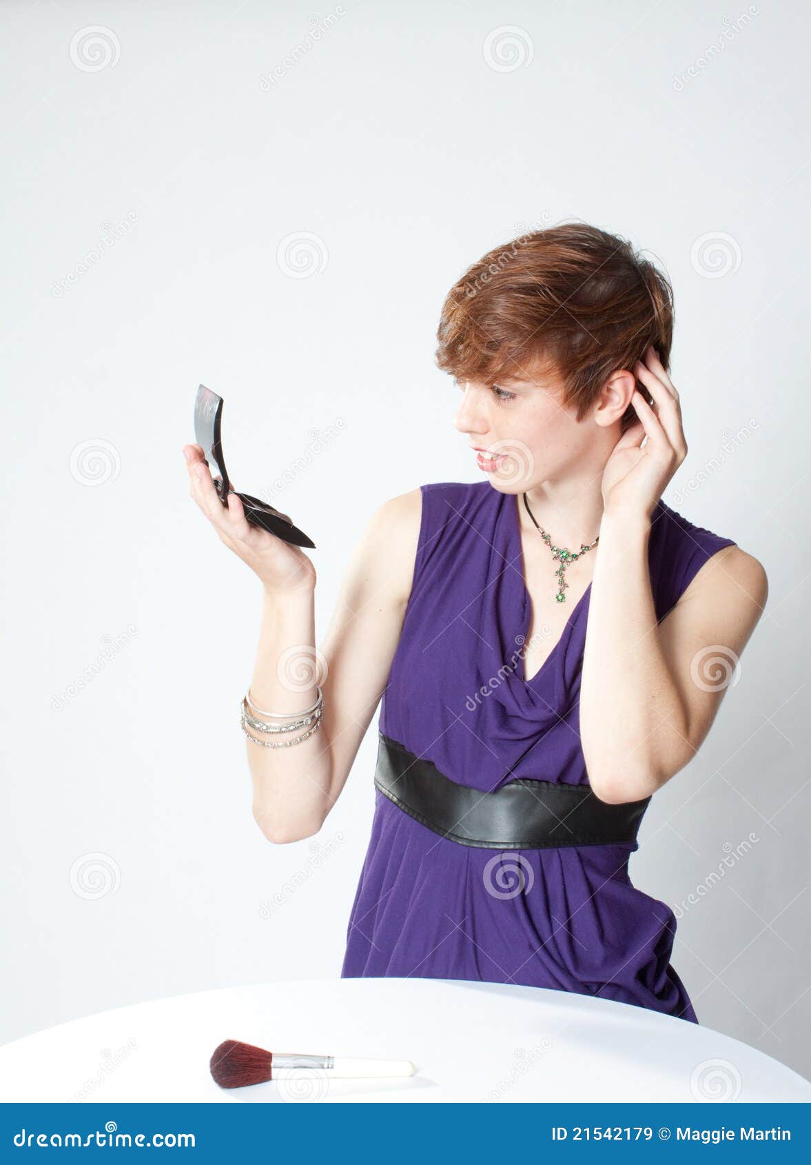 Young Woman Fixing Her Hair Stock Image - Image of colour, bracelets ...