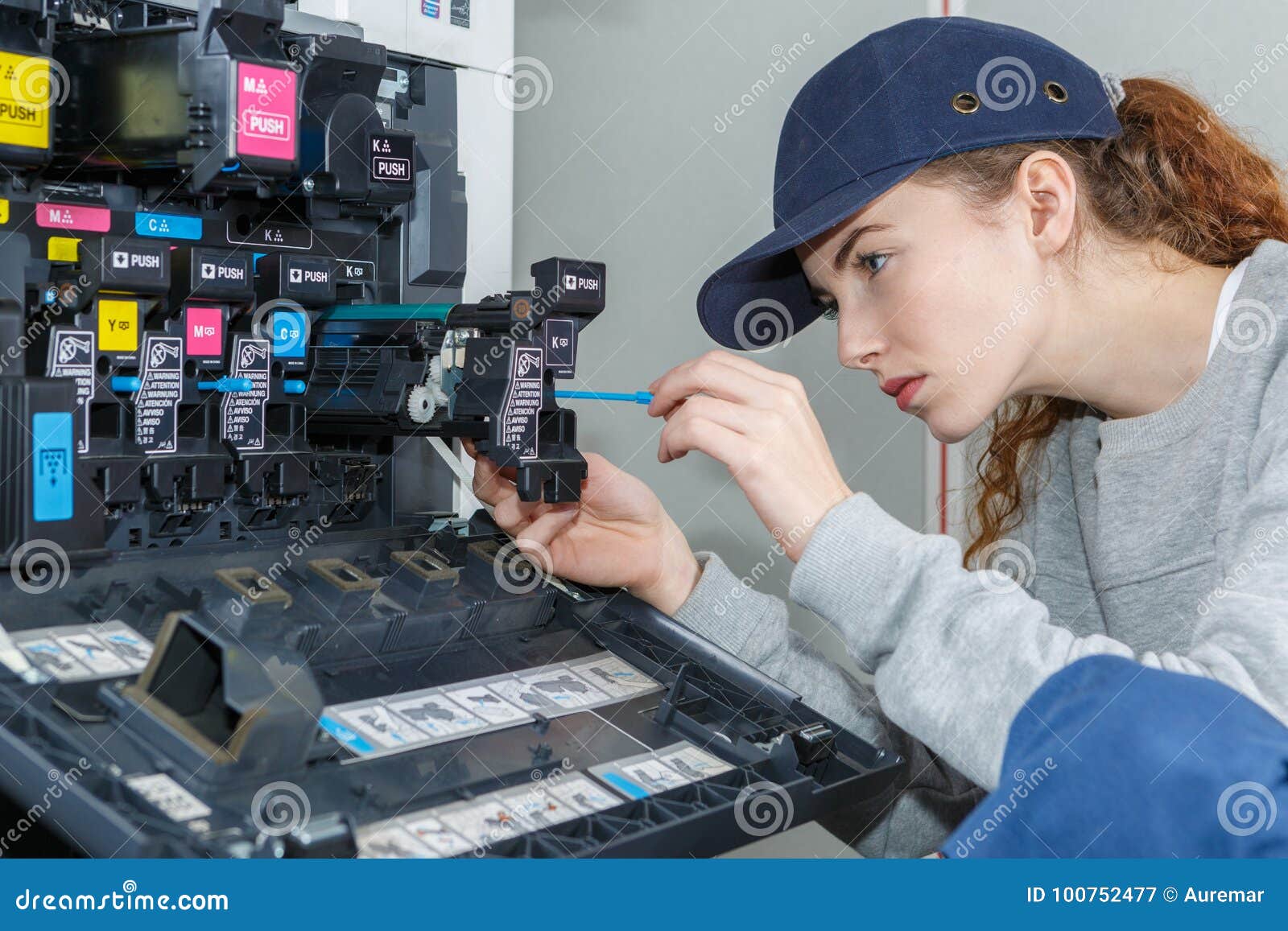 Young woman fixing printer stock image. Image of latina - 100752477