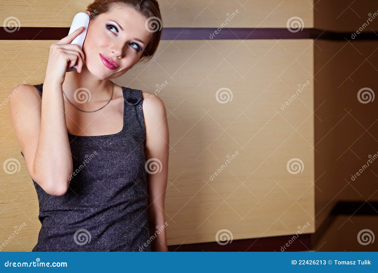 A Young Woman Flirting on the Phone Stock Image - Image of city, phone ...