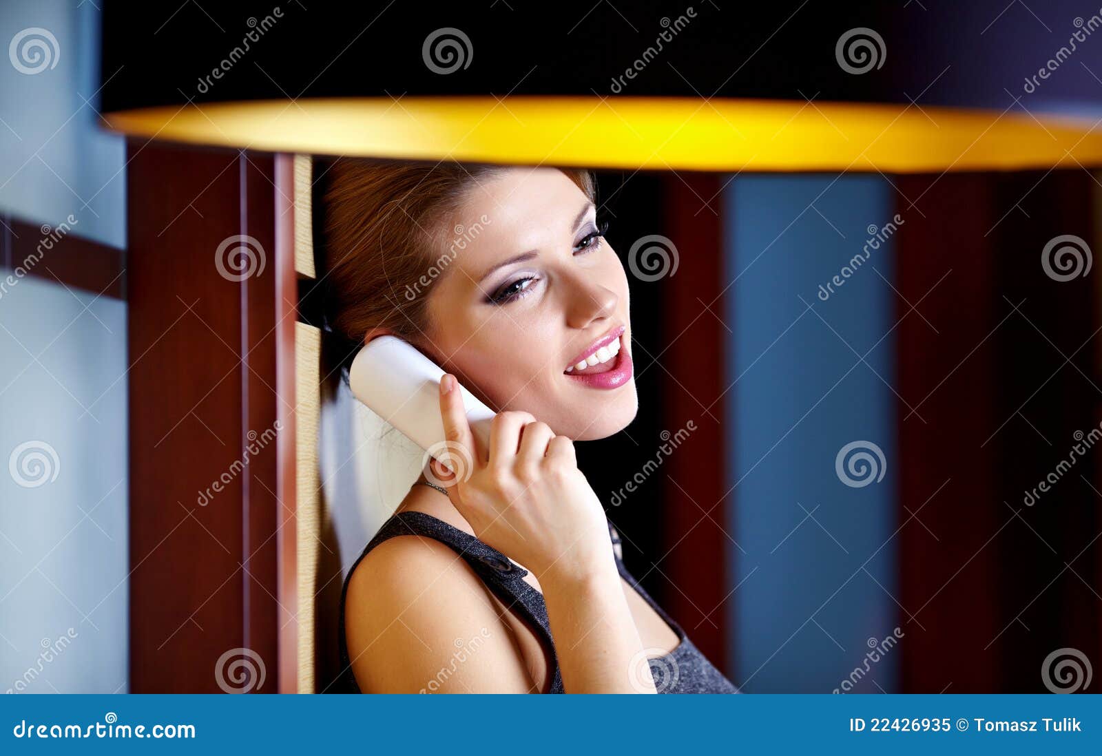 A Young Woman Flirting on the Phone Stock Image - Image of lady, office ...