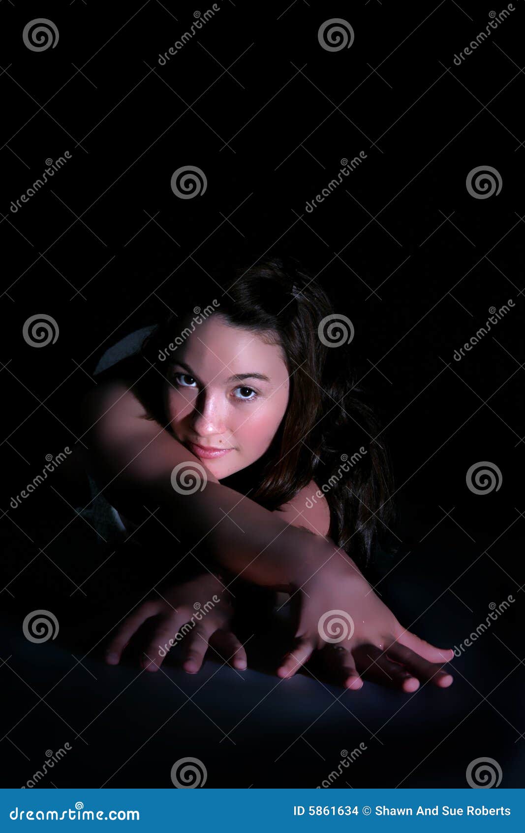 Young Woman on Floor with Hands Out Stock Photo - Image of young ...