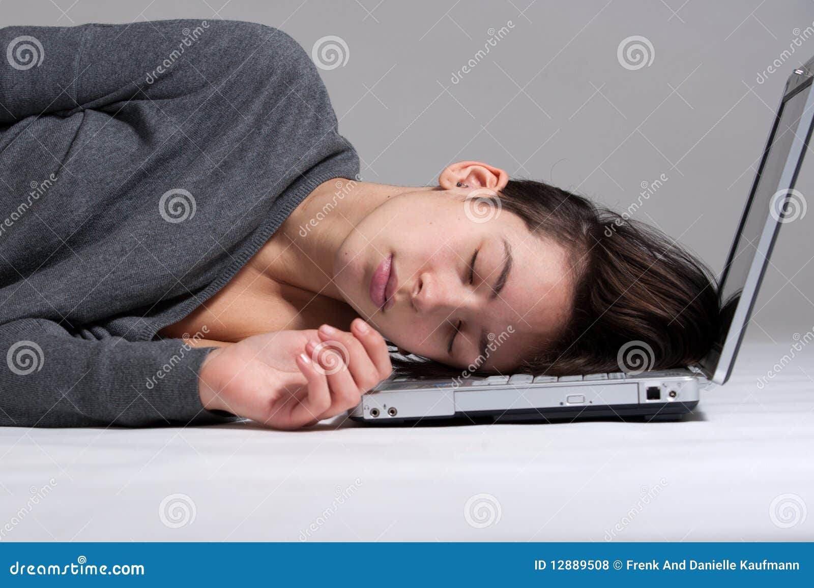 Young Woman on Floor with Notebook Stock Photo - Image of brown ...