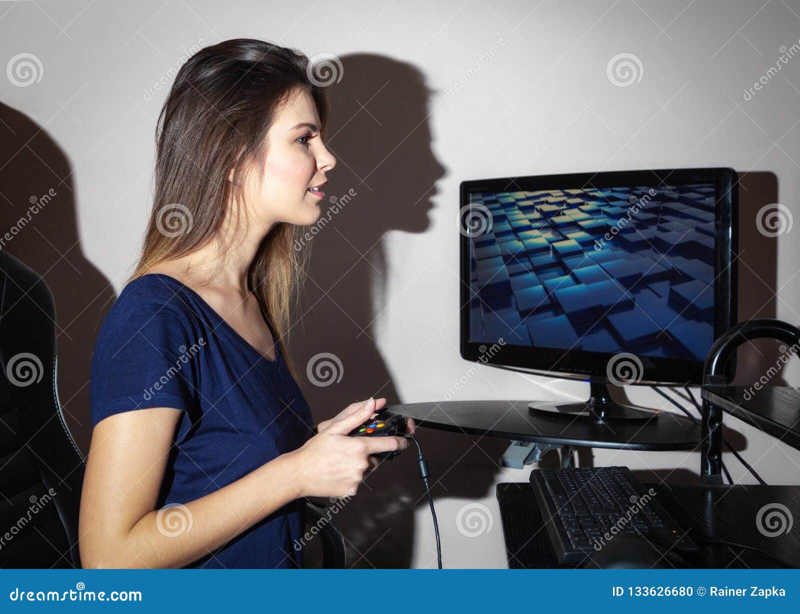 Young Woman with a Game Controller in Hand Stock Photo - Image of couch ...
