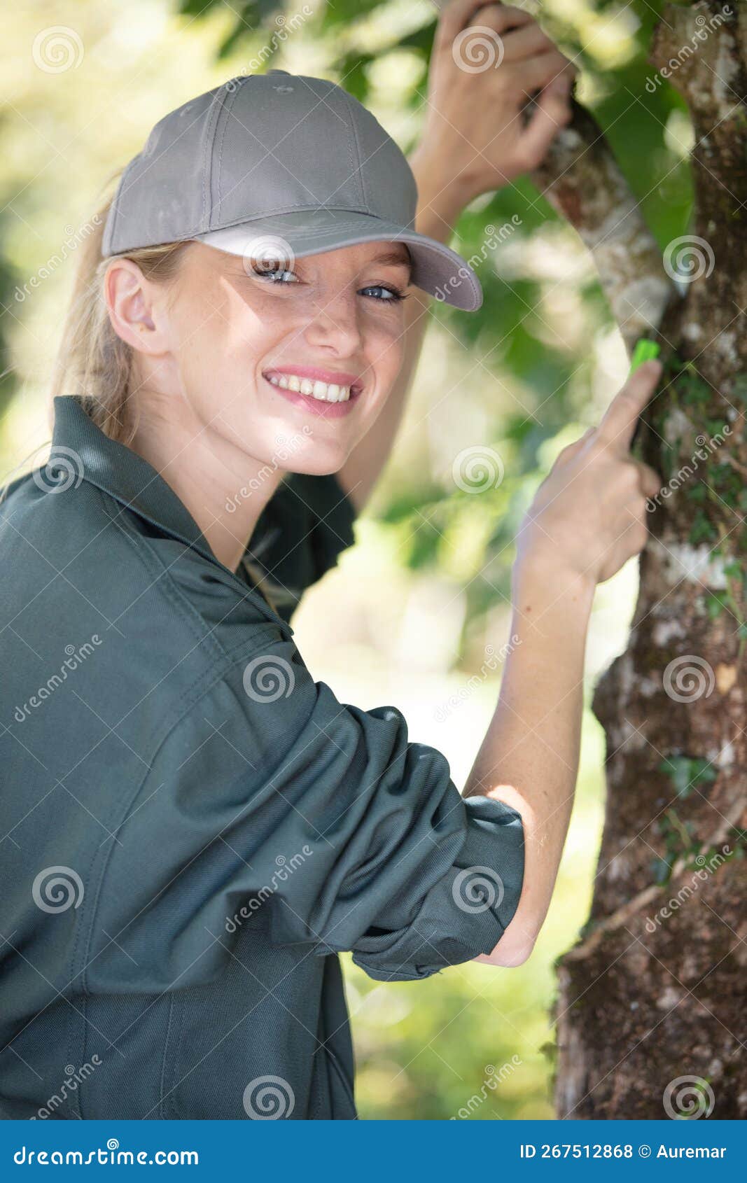 Young Woman Gardener Smiling with Tree Stock Photo - Image of hand ...