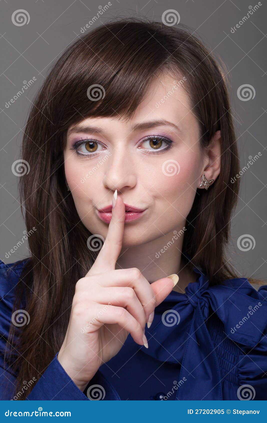 Young Woman Gestures for Silence Stock Image - Image of looking, person ...