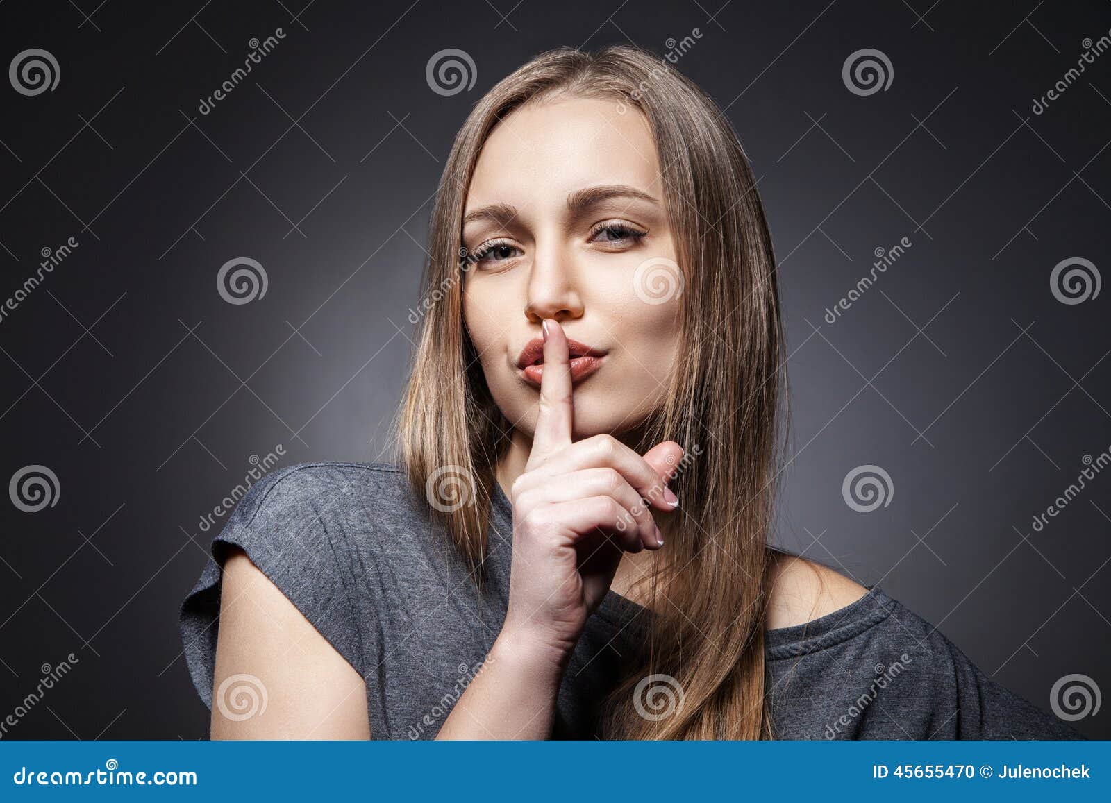 Young Woman Gesturing for Quiet or Shushing Stock Photo - Image of ...