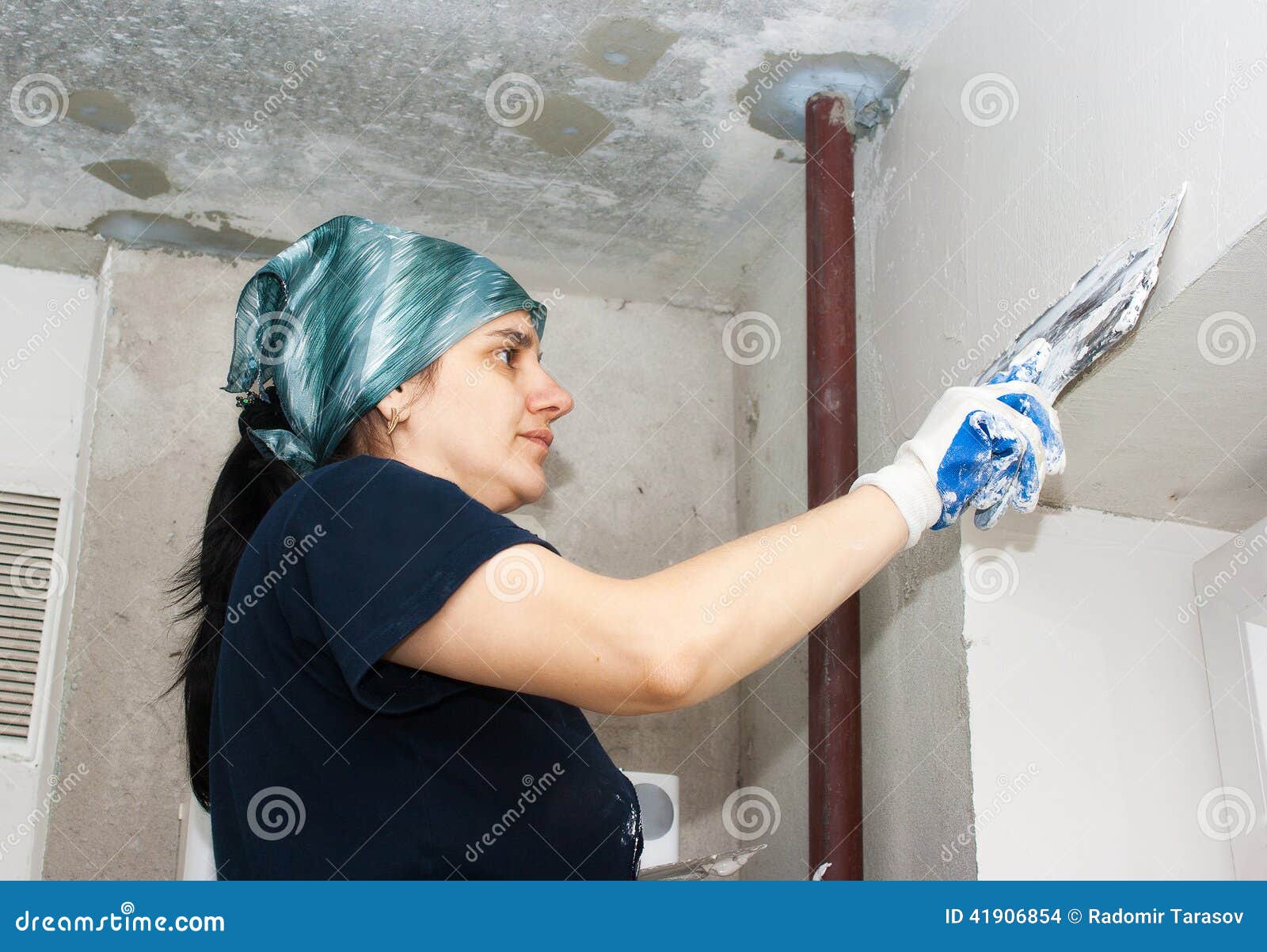 Young Woman Gets Plaster Wall Stock Photo - Image of prepared, labour ...