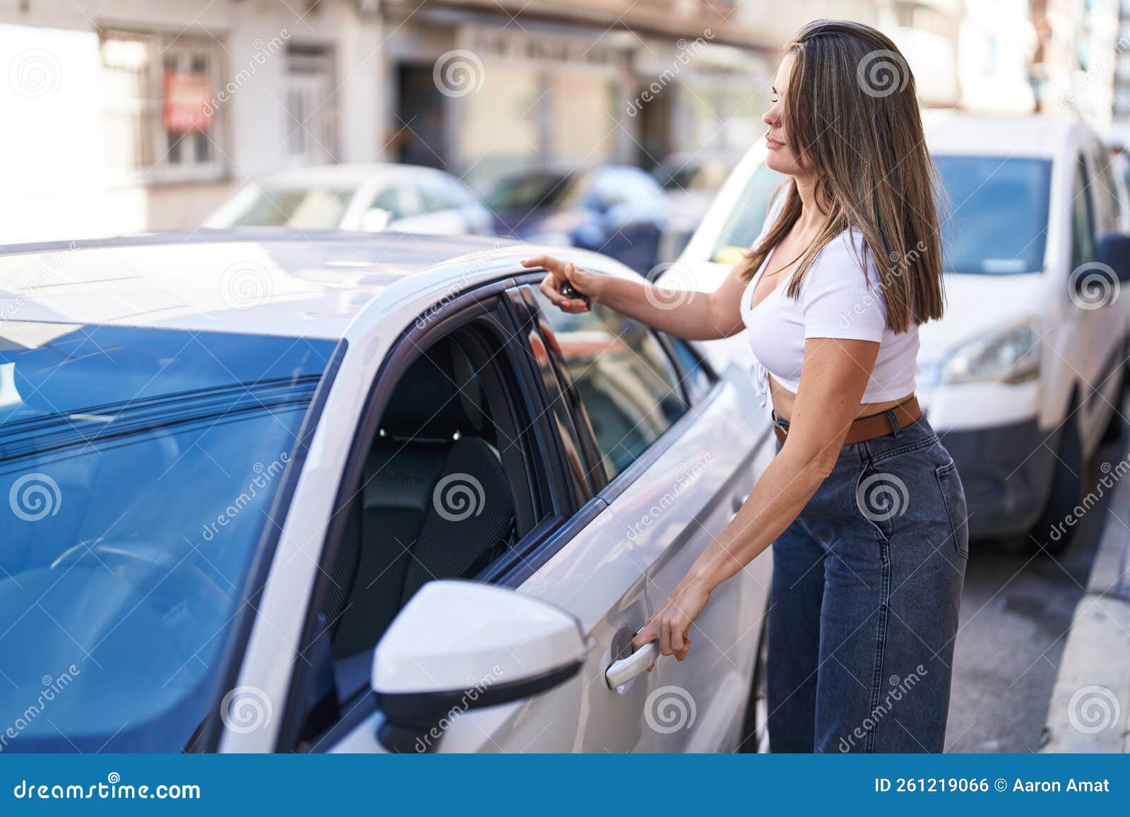 Young Woman Getting in Car at Street Stock Photo - Image of driving ...