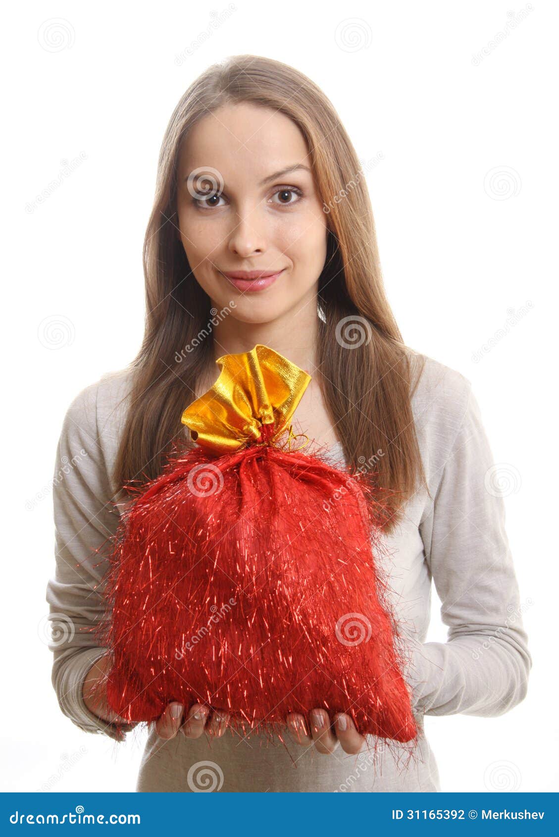 Young woman with gift sack stock photo. Image of season - 31165392