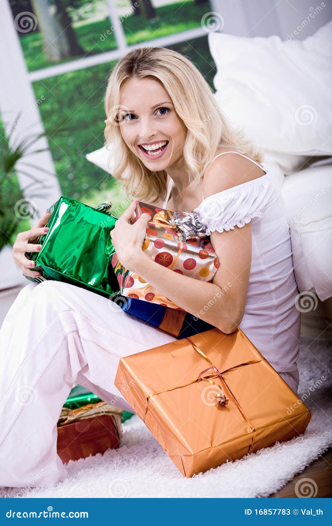 Young woman with gifts stock image. Image of beautiful - 16857783