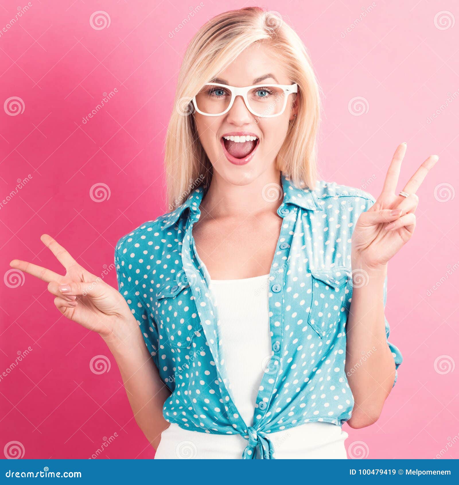 Young Woman Giving the Peace Sign Stock Image - Image of success, show ... Young Woman Giving the Peace Sign Stock Image - Image of success, show ...