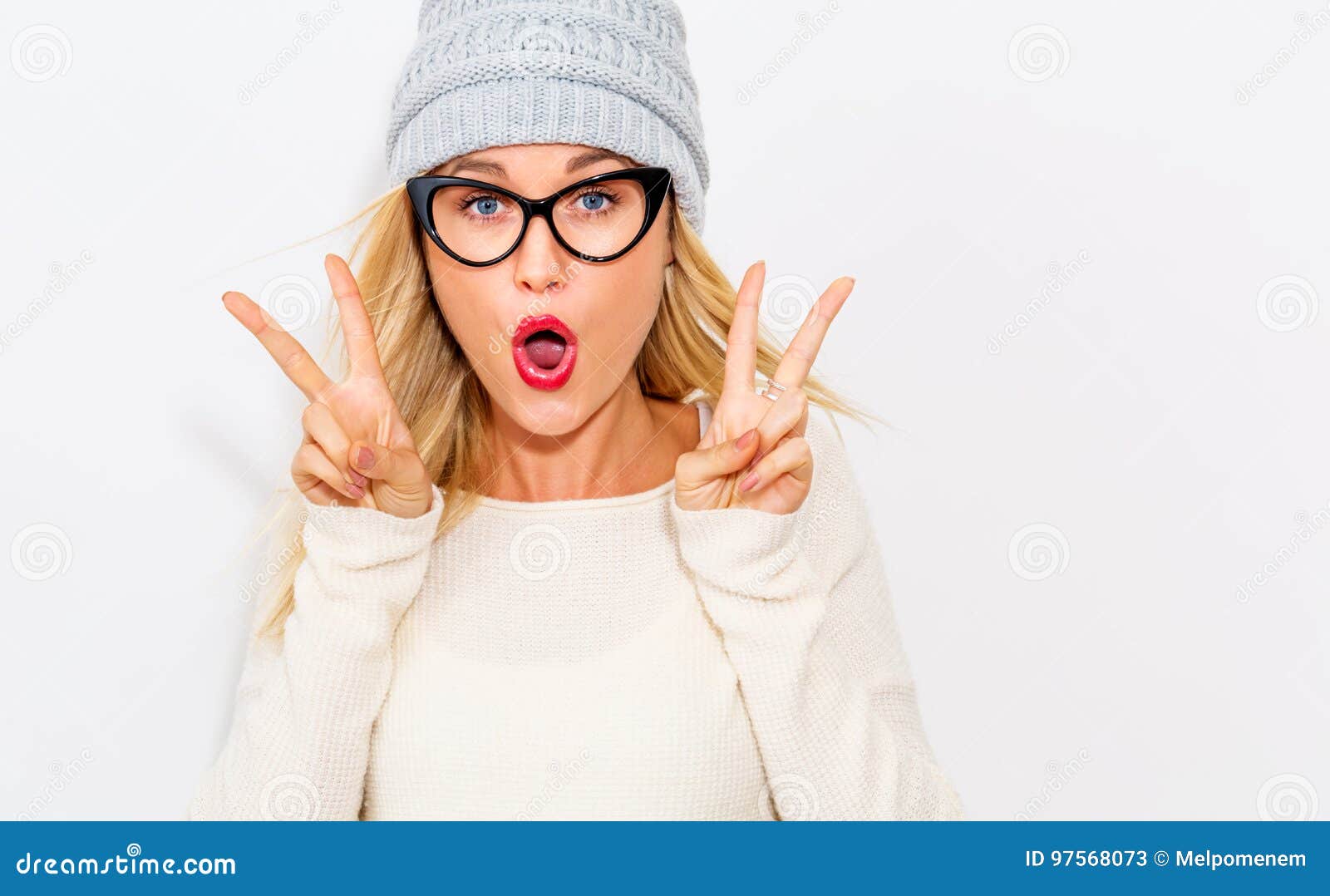 Young Woman Giving the Peace Sign Stock Image - Image of show ...