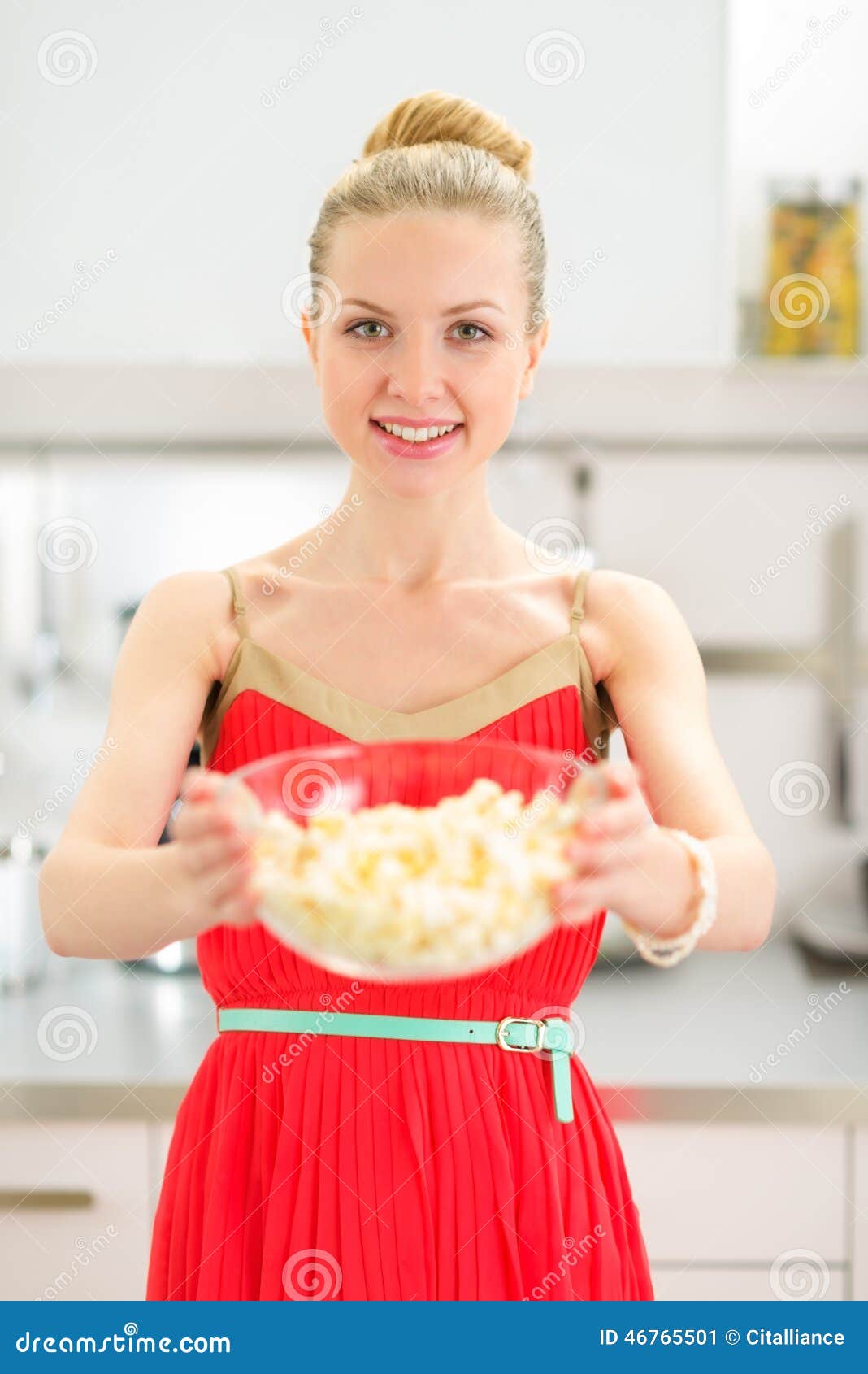 Young woman giving popcorn stock image. Image of modern - 46765501