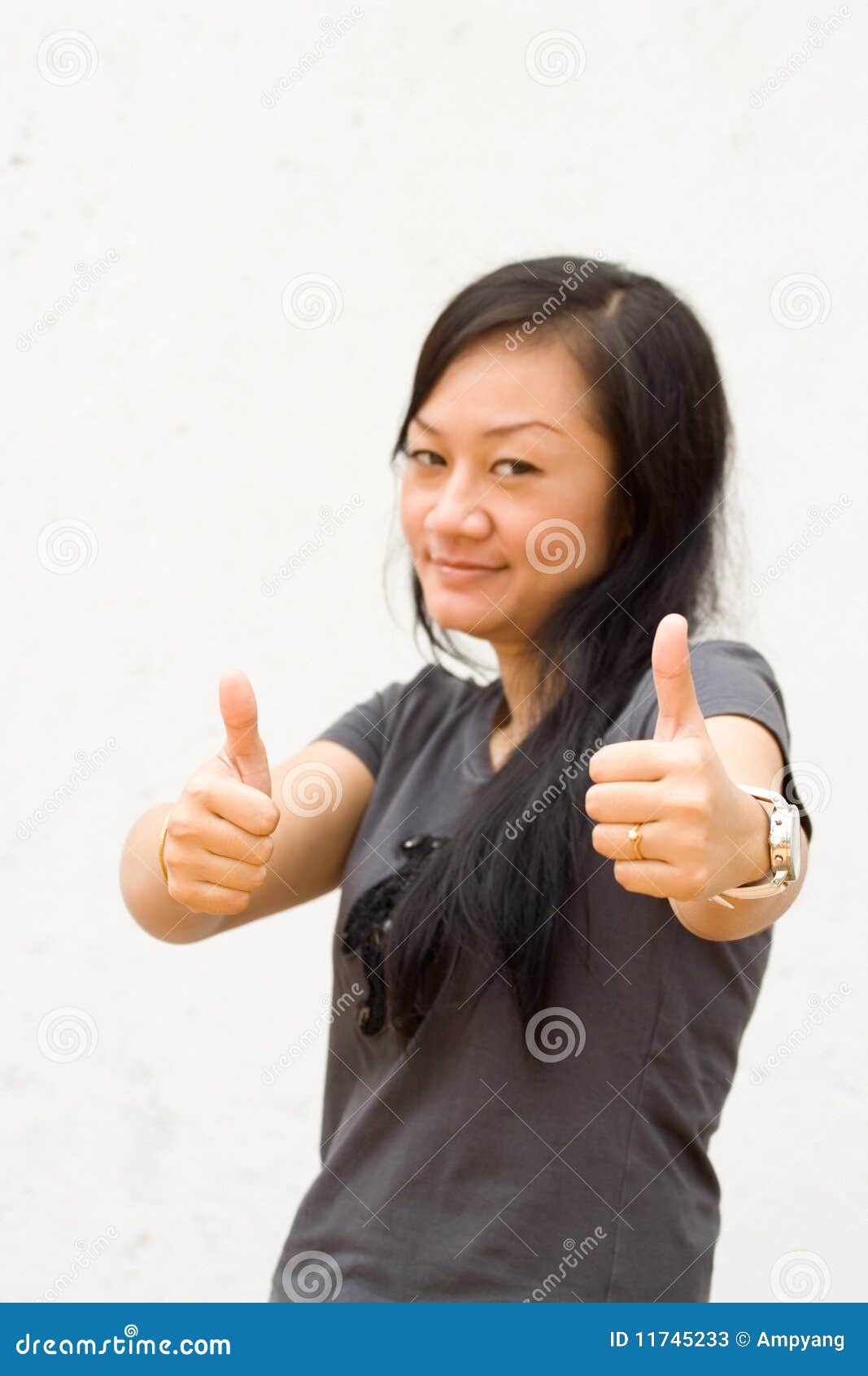 Young Woman Giving Two Thumbs Up Stock Image - Image of female, young ...