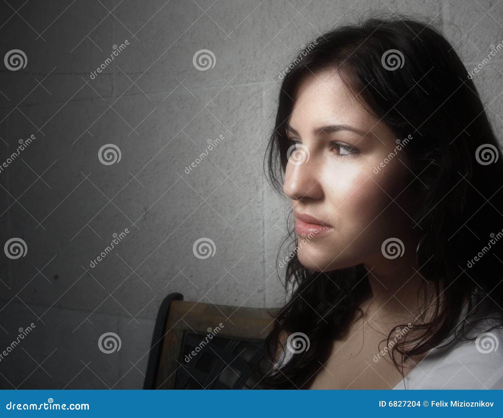 Young woman glancing away stock photo. Image of person - 6827204