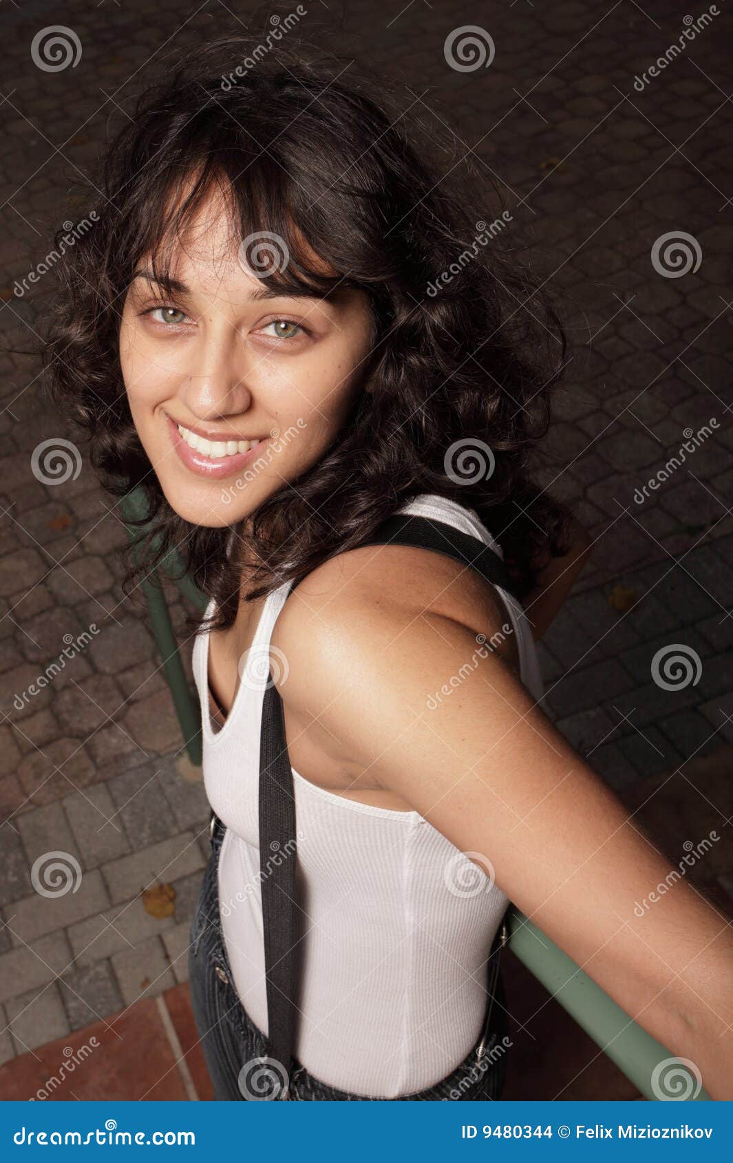 Young Woman Glancing at Camera Stock Photo - Image of happy, shot: 9480344