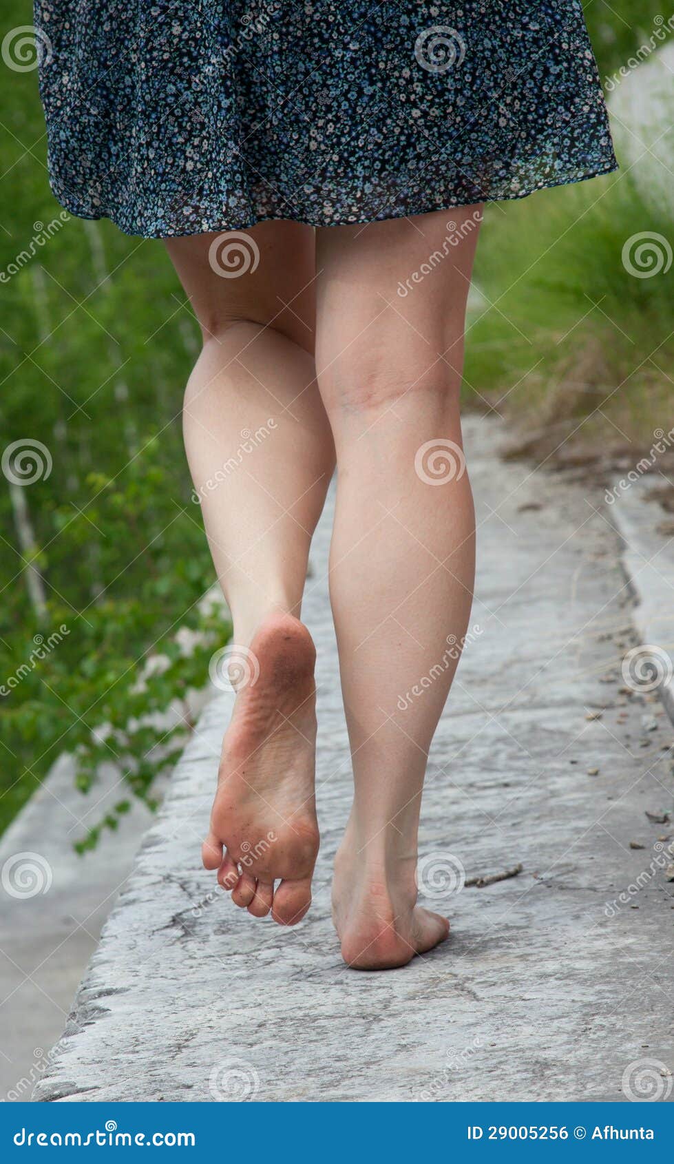 A Young Woman Goes Barefoot Stock Photo - Image of outdoors, walking ...