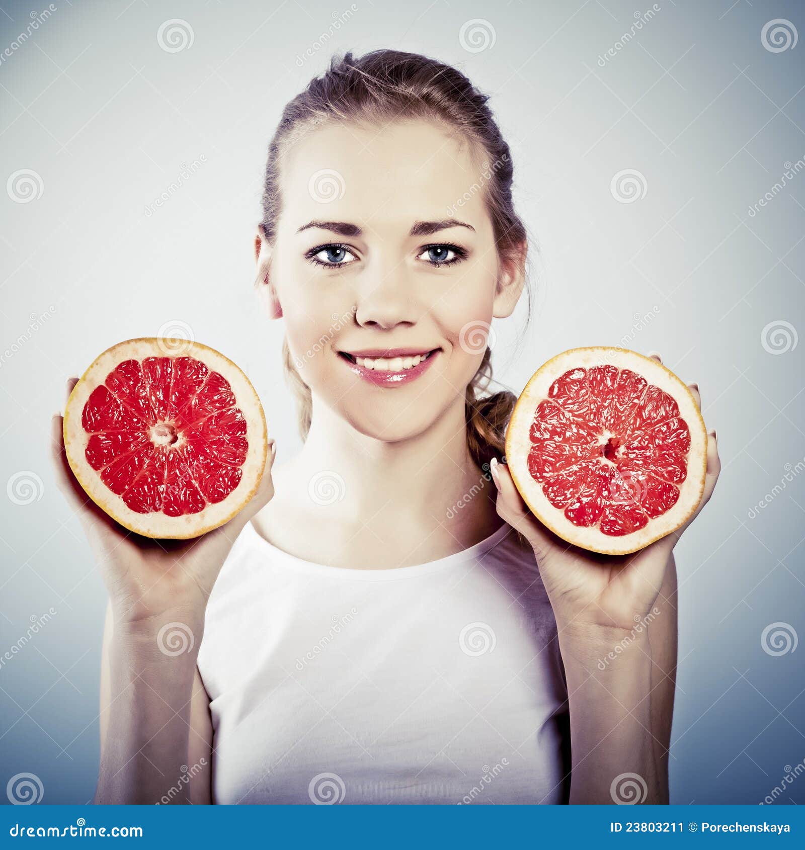 Young Woman with Grapefruit Stock Image - Image of female, braided ...