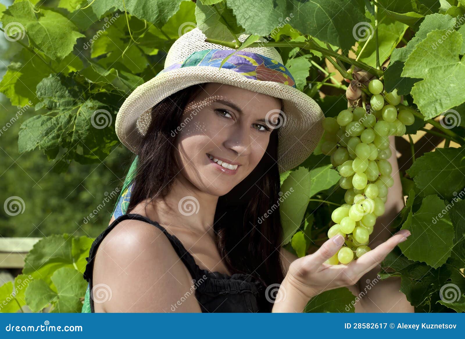 Young woman with grapes stock image. Image of woman, person - 28582617