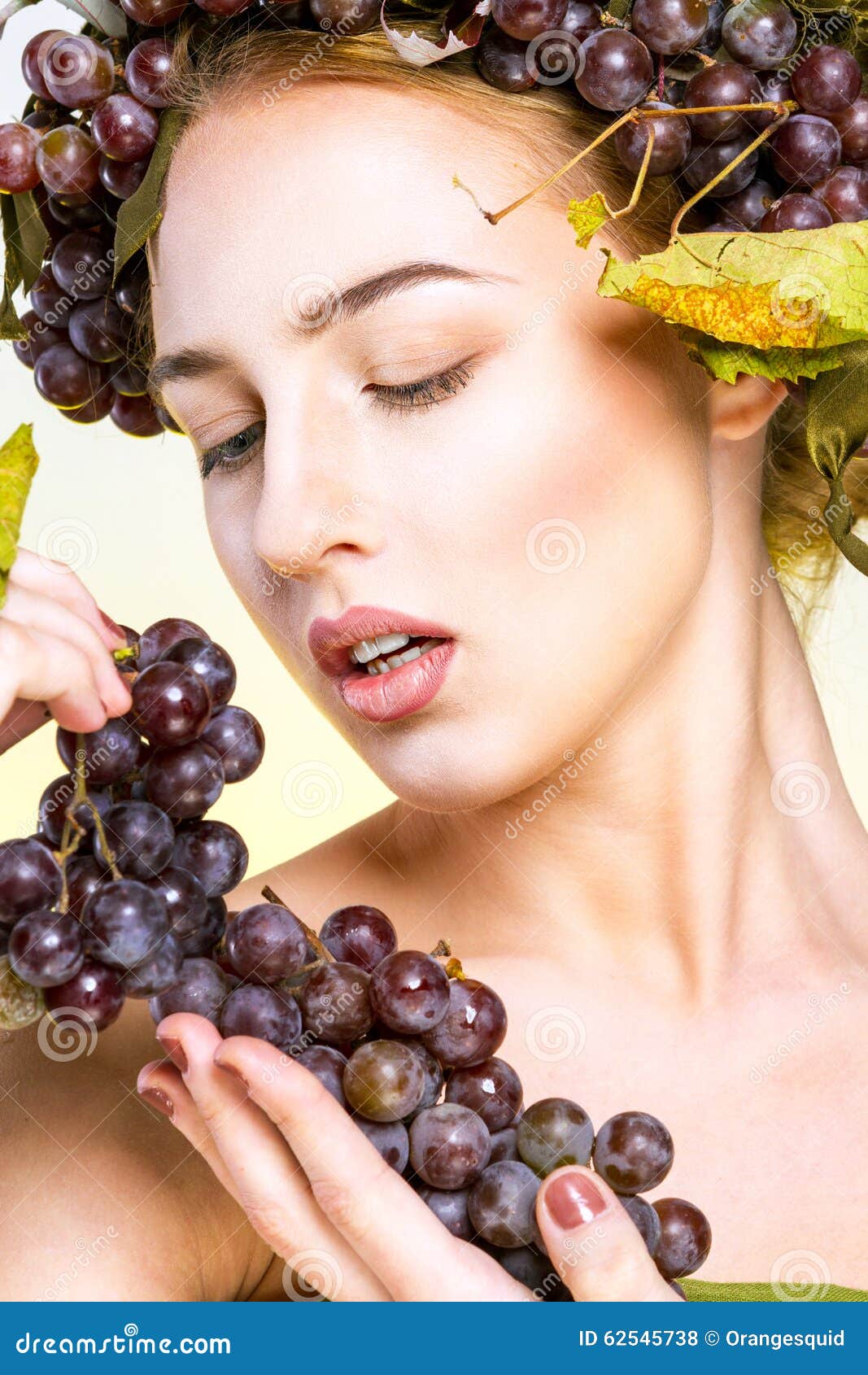 Young woman with grapes stock photo. Image of juicy, hand - 62545738