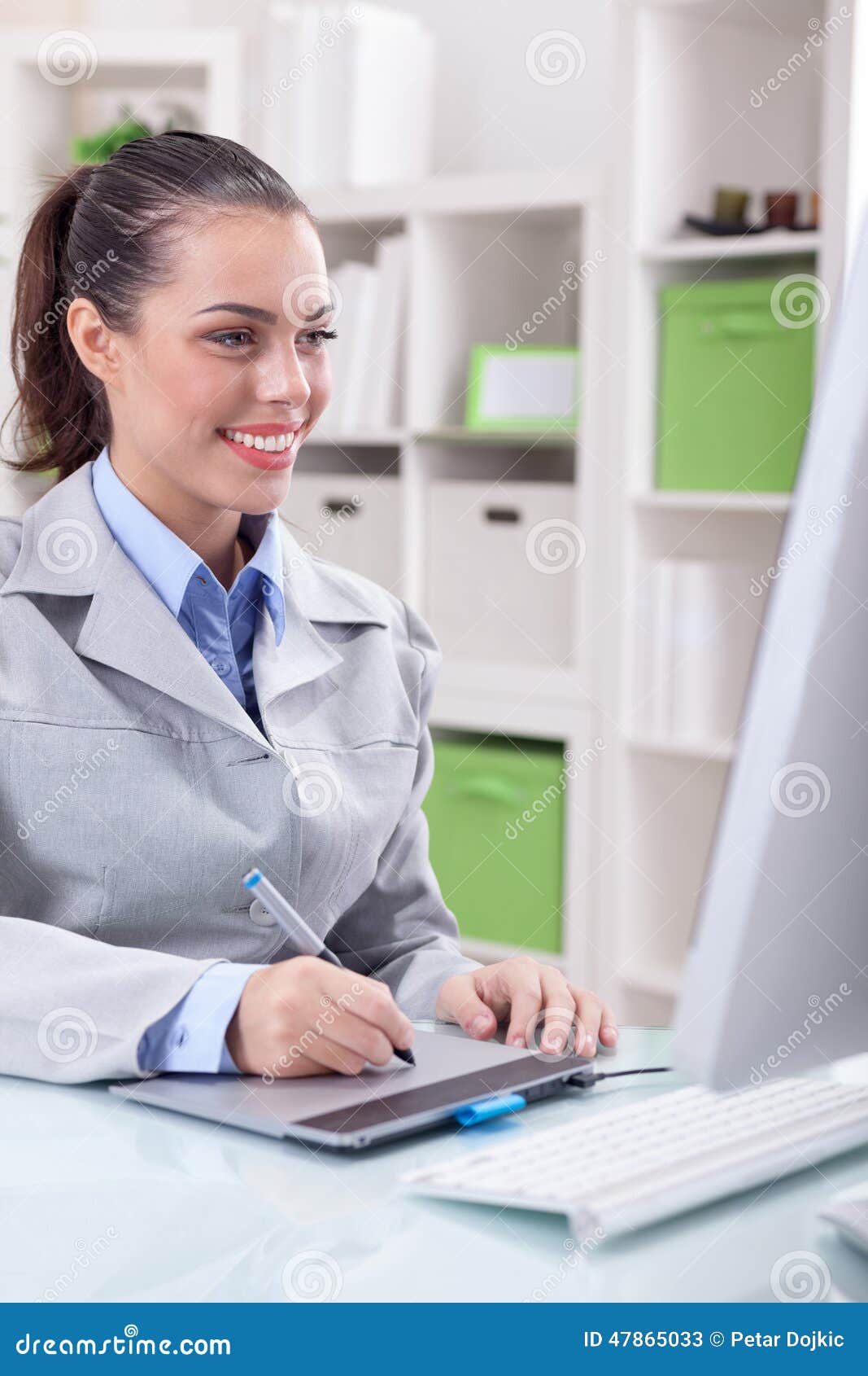 Young Woman Graphic Designer Using Computer and Graphic Tablet Stock ...