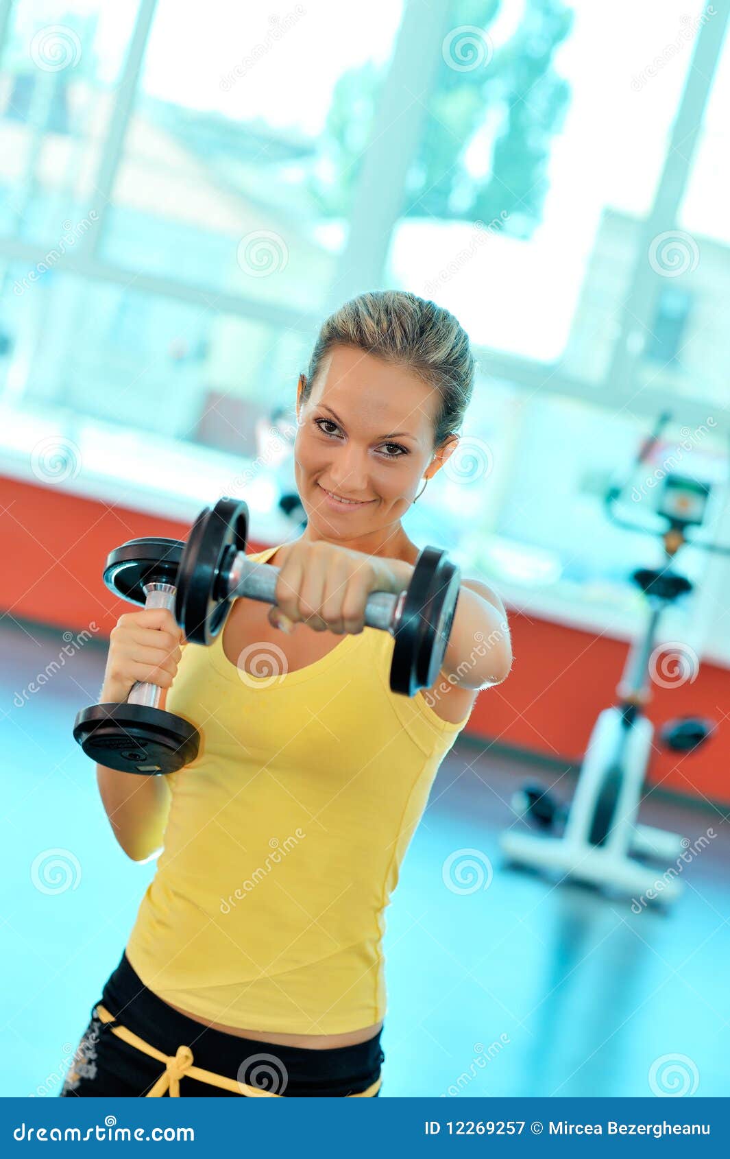 Young woman in the gym stock image. Image of recreation - 12269257