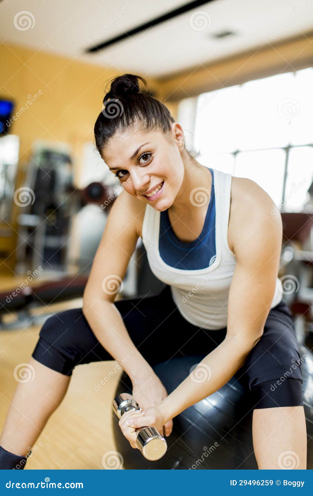Young woman in the gym stock image. Image of adult, handsome - 29496259