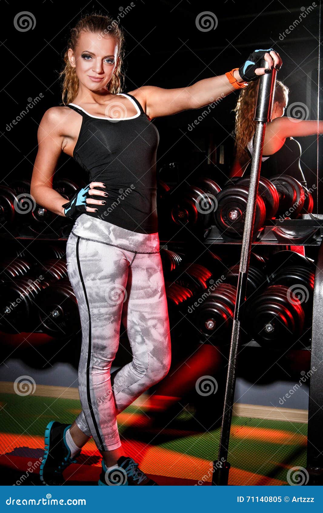 Young woman in a gym stock image. Image of muscles, girl - 71140805