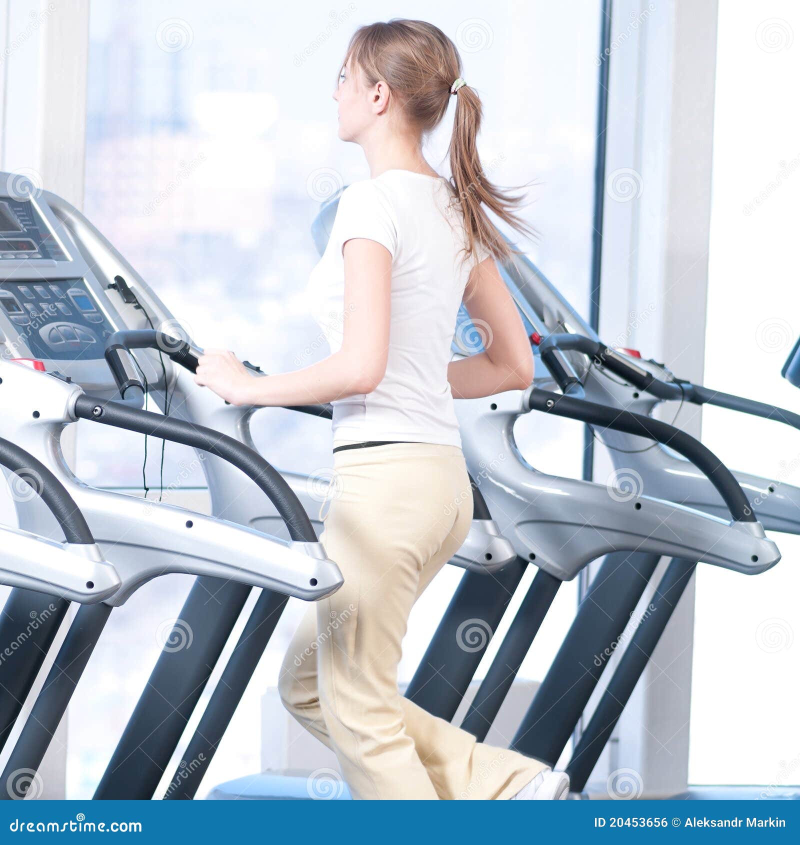Young Woman at the Gym Exercising. Running Stock Photo - Image of ...