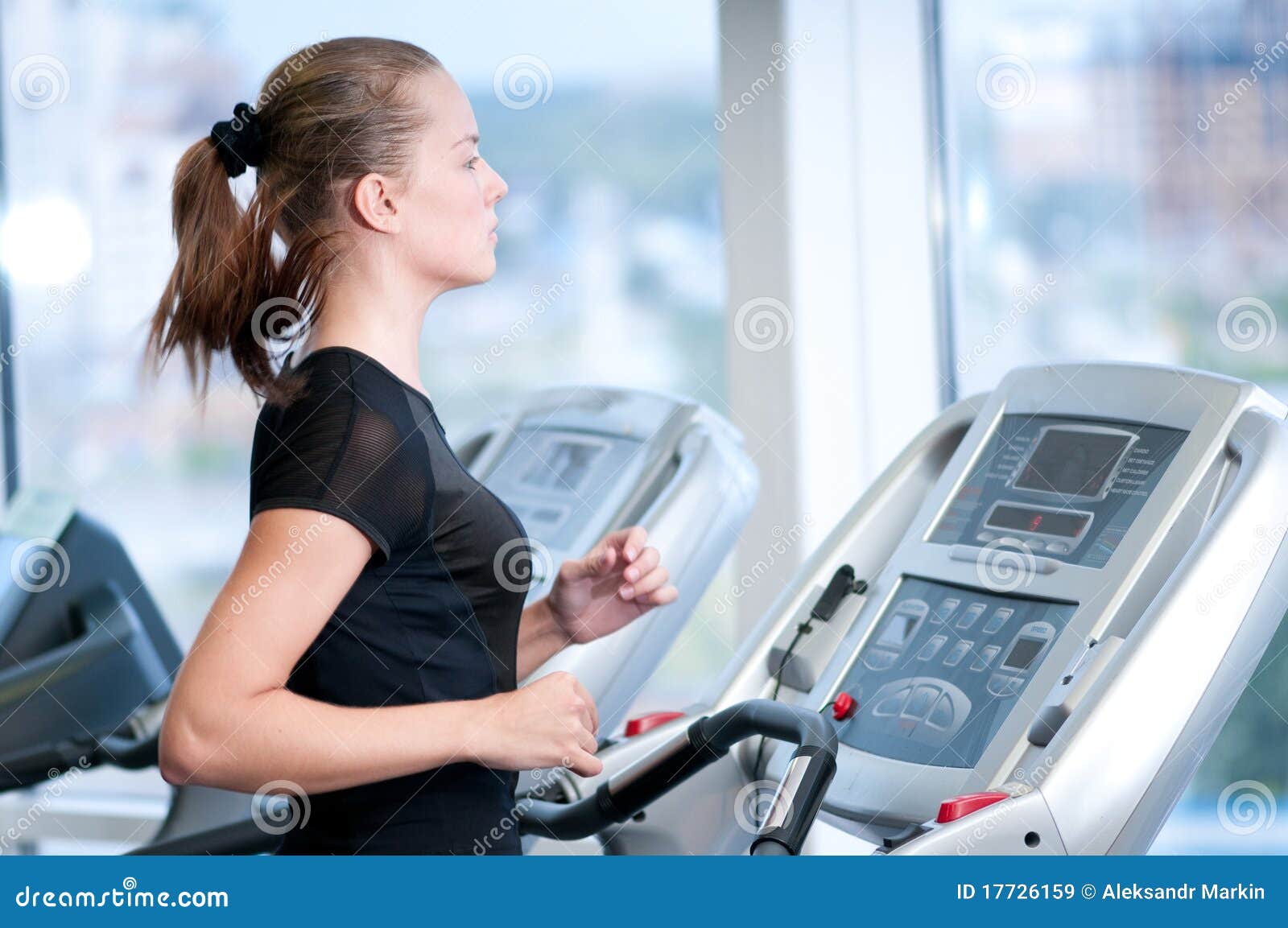 Young Woman at the Gym. Run on a Machine Stock Image - Image of blue ...
