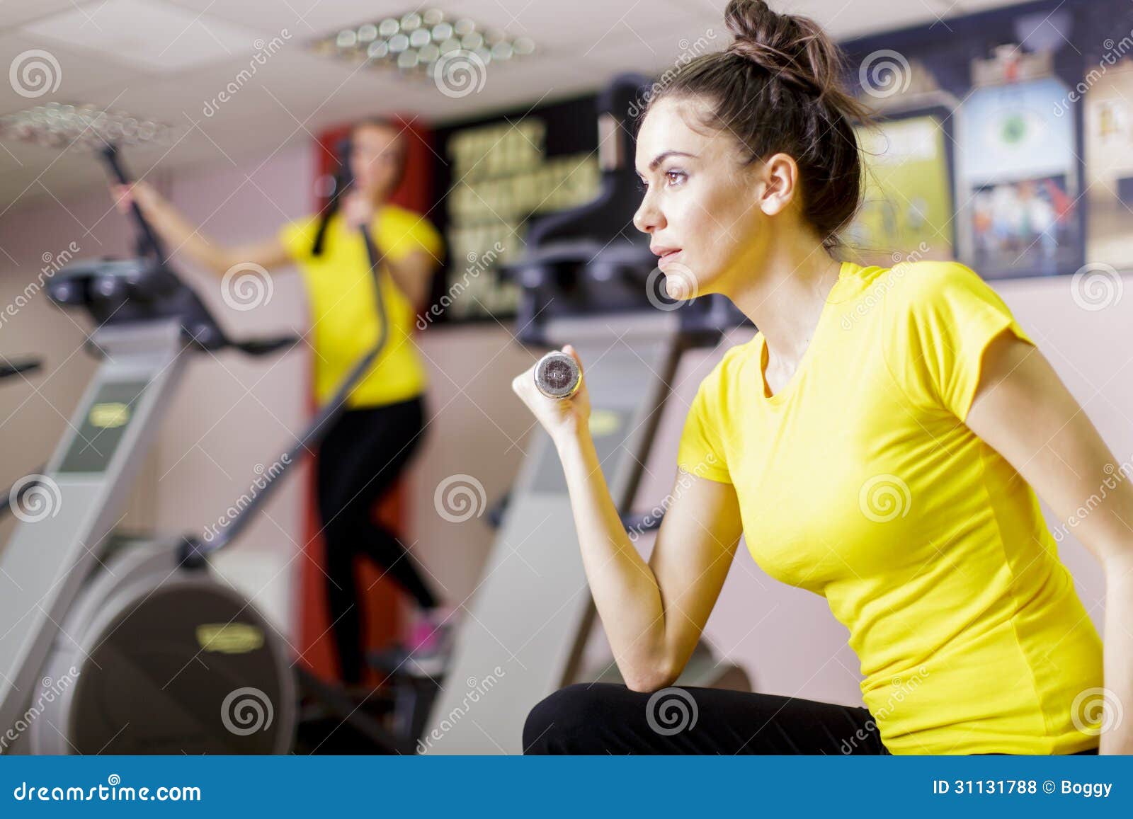 Young woman in the gym stock photo. Image of indoors - 31131788