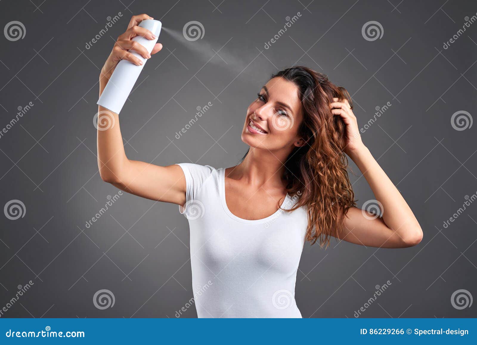 Young Woman with a Hairspray Stock Photo - Image of product, pretty ...