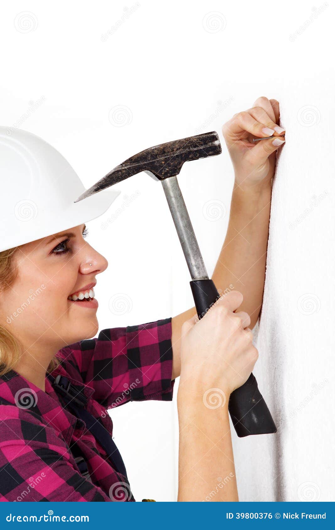 Young woman with a hammer stock photo. Image of design - 39800376